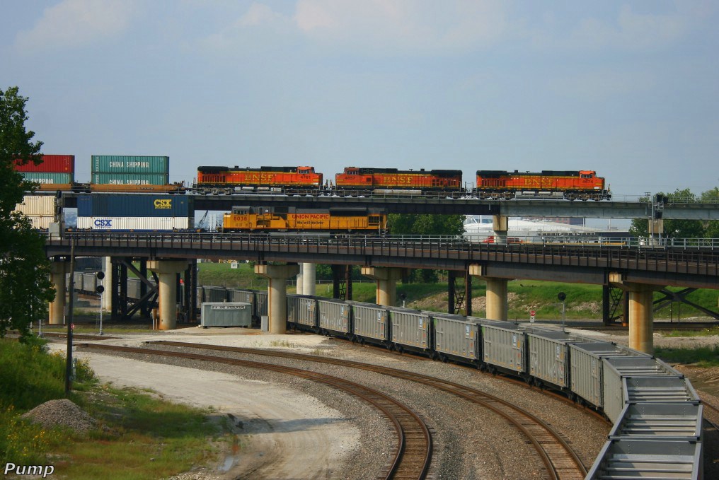 Eastbound BNSF Intermodal Train Passing Over a Westbound UP Intermodal Train DPU and a ...